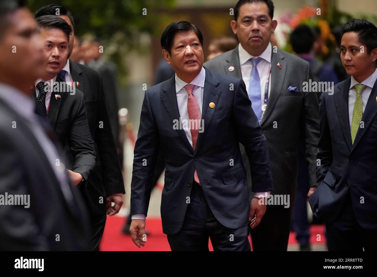 Philippine's President Ferdinand Marcos, Jr., center, leaves after attending the East Asia ...