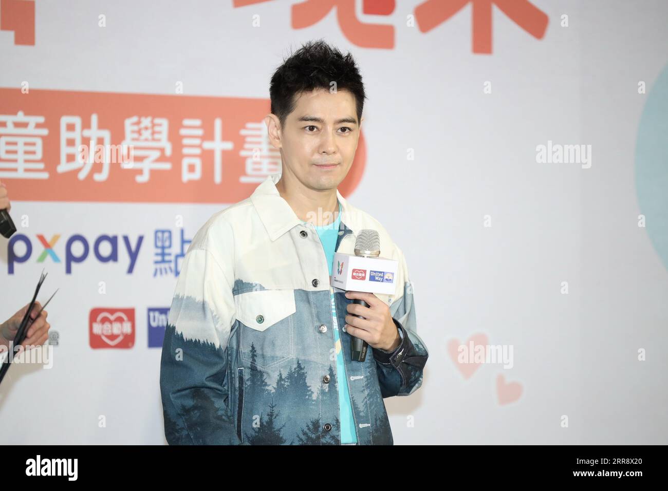 Taiwanese singer, actor, and race car driver Jimmy Lin attends a public ...