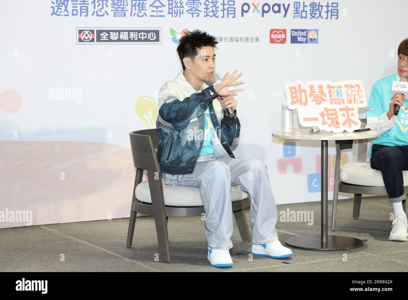 Taiwanese singer, actor, and race car driver Jimmy Lin attends a public ...