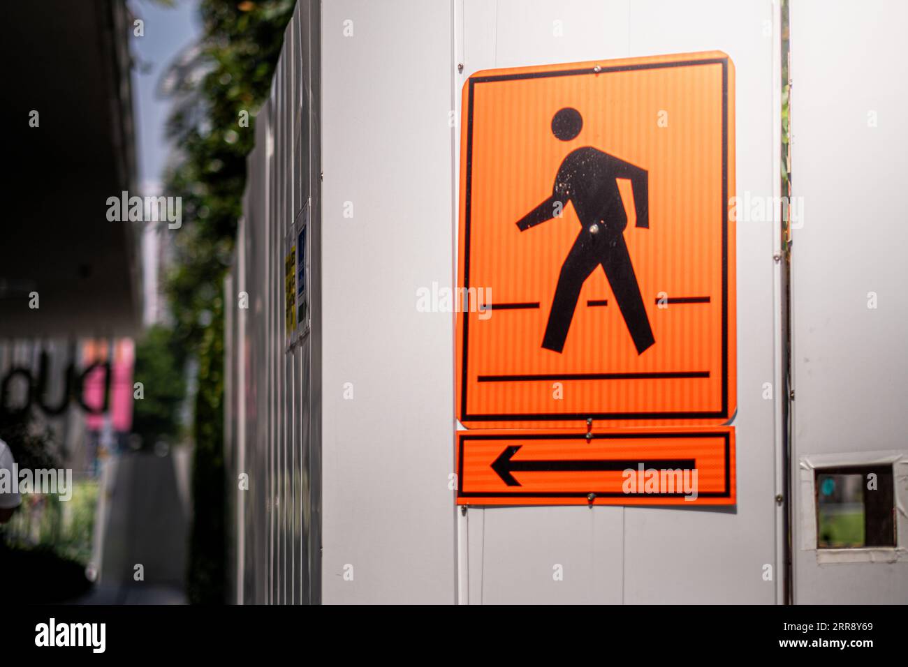 Pedestrian crossing sign under construction with orange color Stock ...