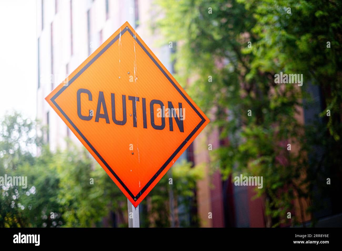 Pedestrian crossing sign under construction with orange color Stock ...