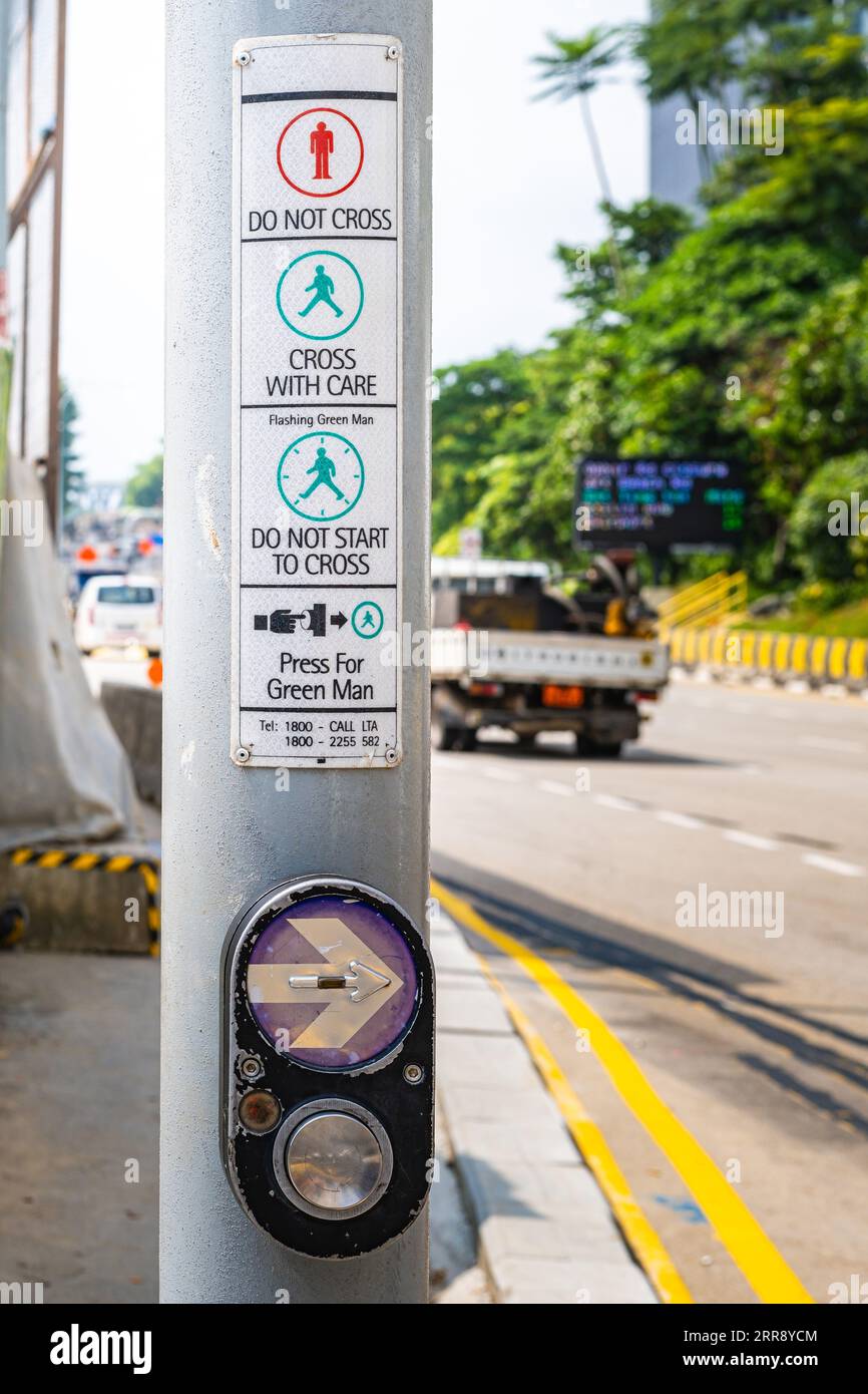 Traffic light button at a pedestrian crossing Stock Photo - Alamy