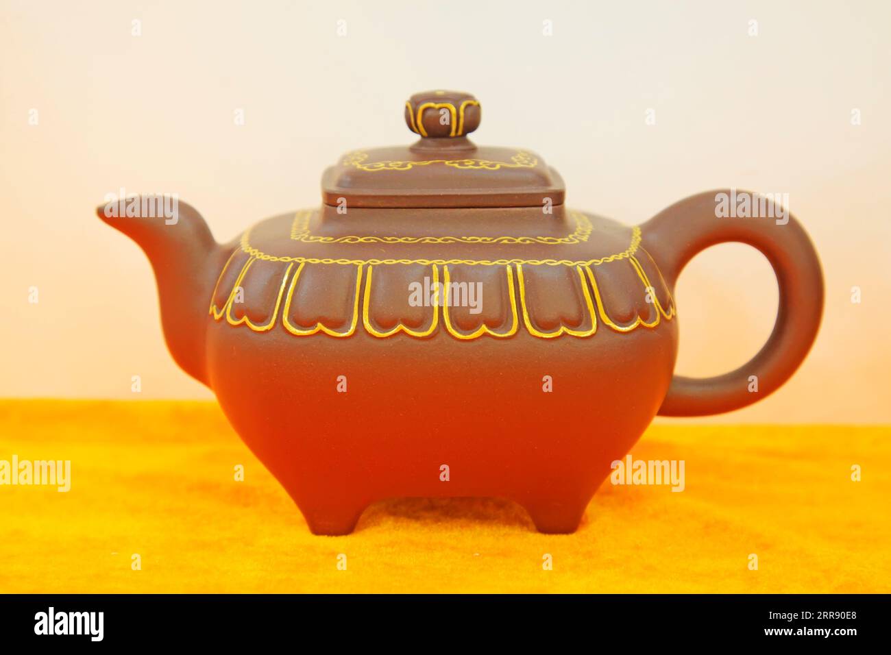 Purple sand teapot crafts Stock Photo - Alamy