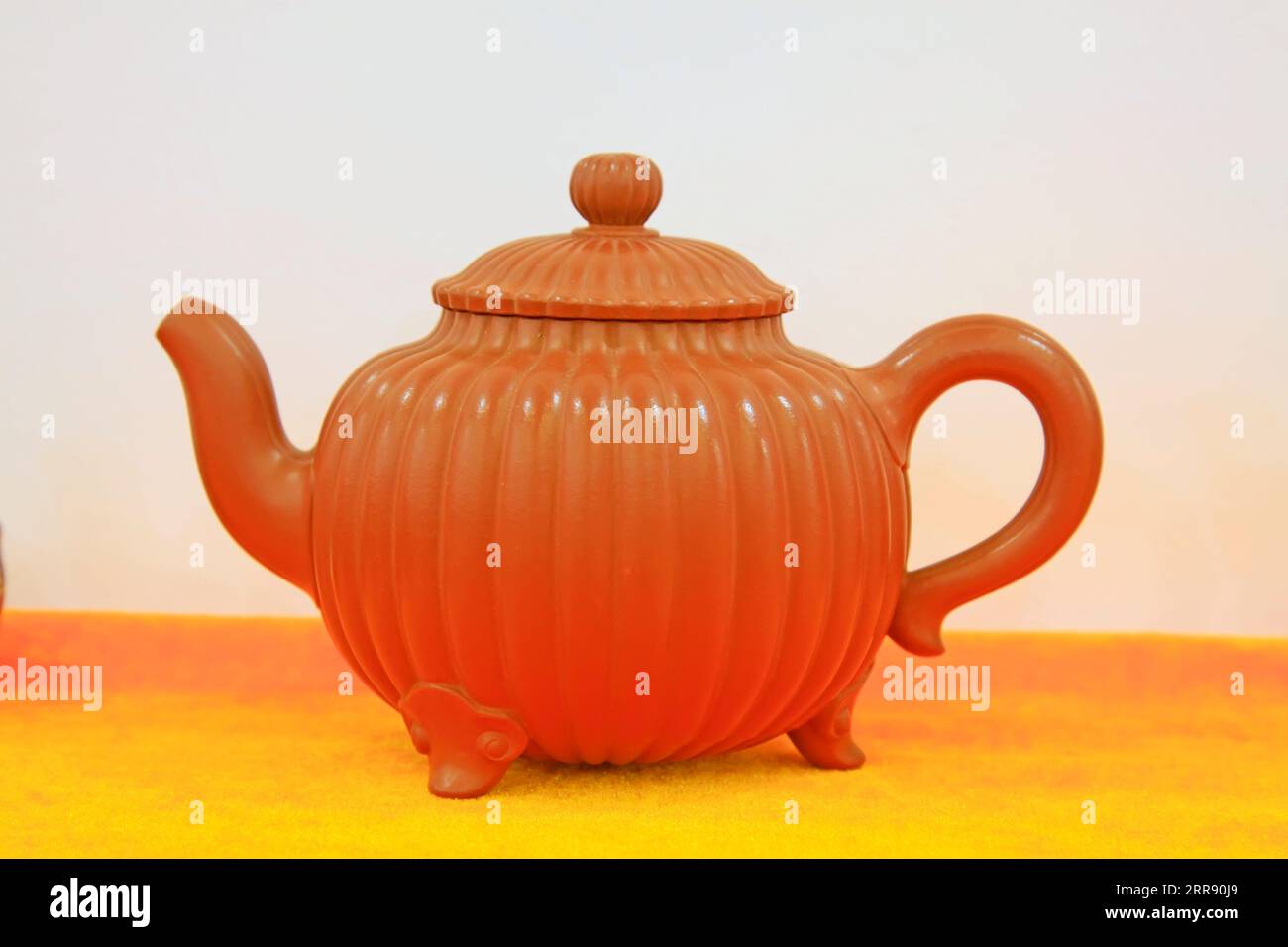 Purple sand teapot crafts Stock Photo - Alamy