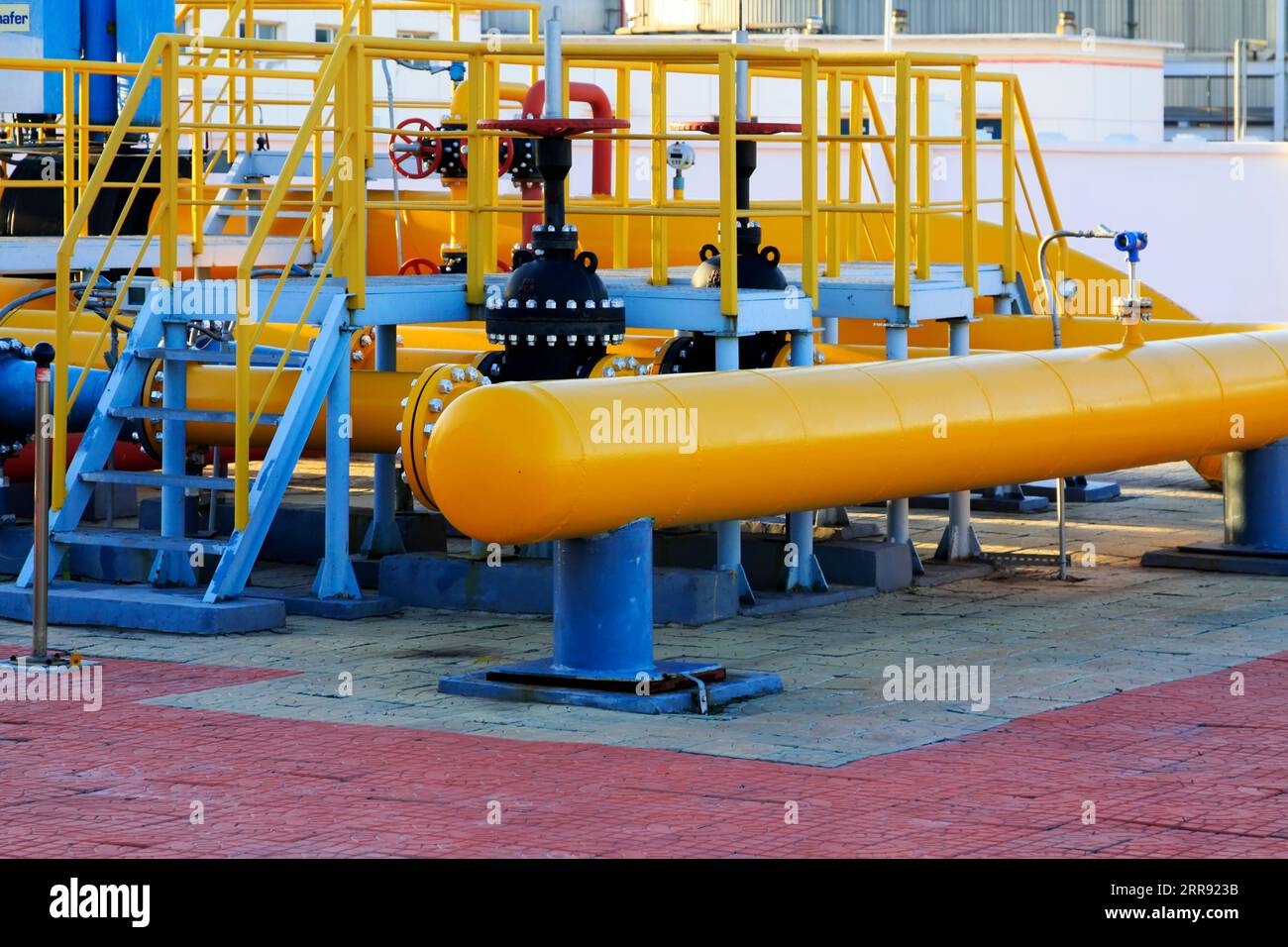 Oil refinery pipeline facilities, closeup of photo Stock Photo - Alamy