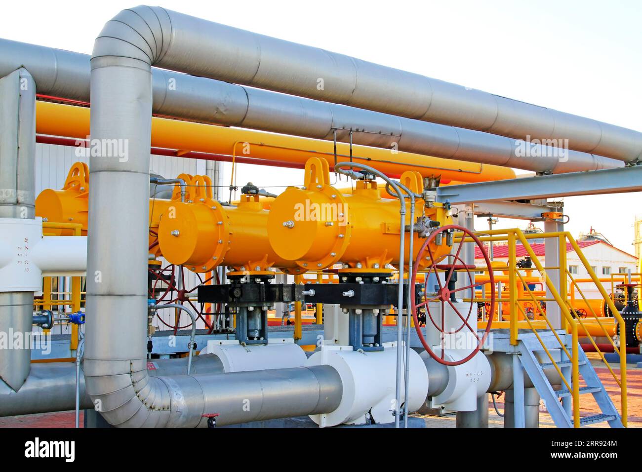 Oil refinery pipeline facilities, closeup of photo Stock Photo - Alamy