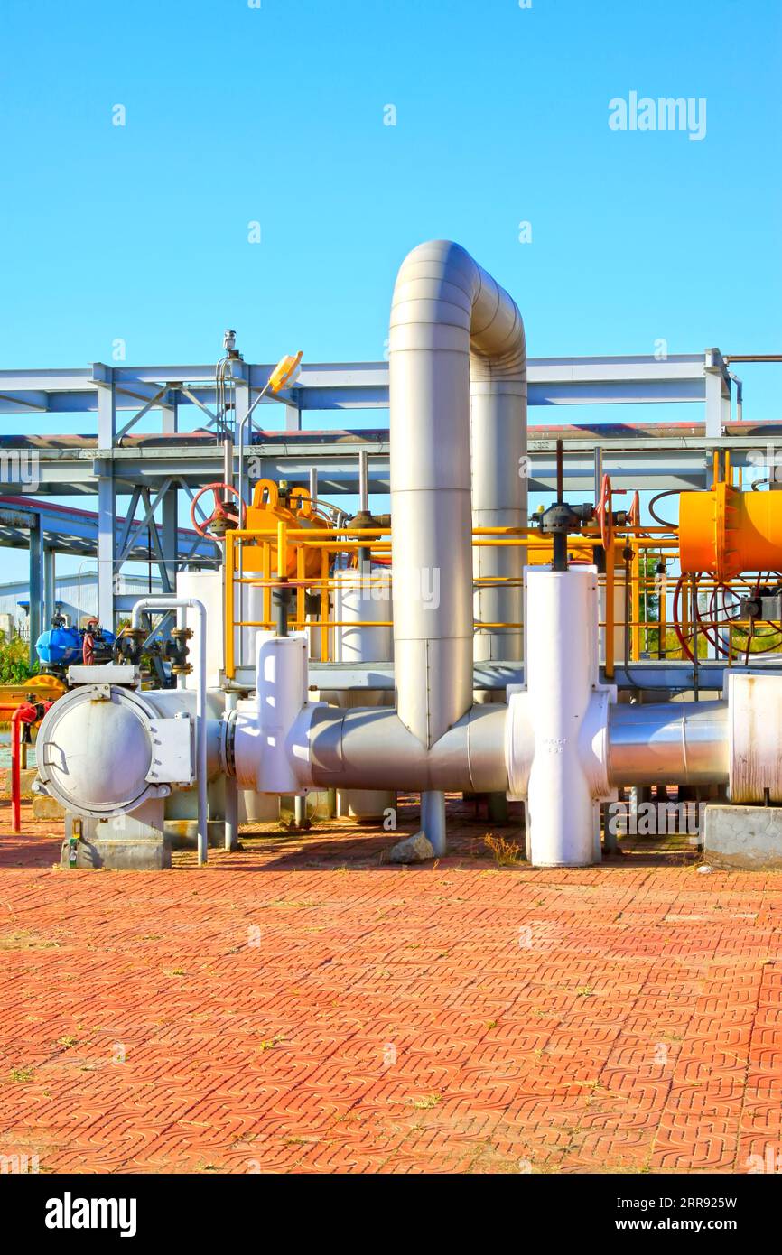 Refinery pipeline facilities, closeup of photo Stock Photo - Alamy