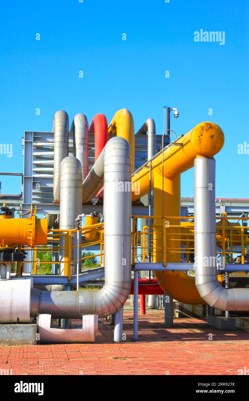 Refinery pipeline facilities, closeup of photo Stock Photo - Alamy