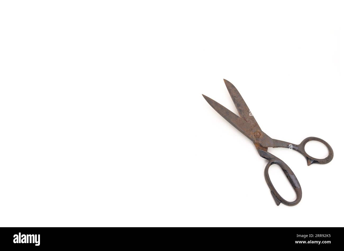 old and rusty scissors (around 1967) on white Background Stock Photo ...