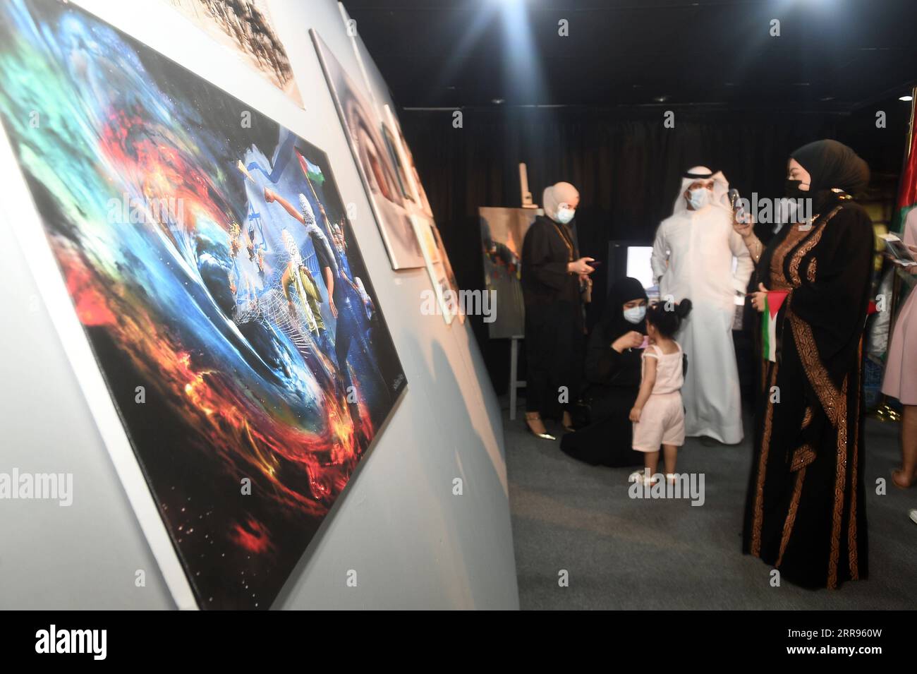 210529 -- KUWAIT CITY, May 29, 2021 -- People visit an art exhibition ...