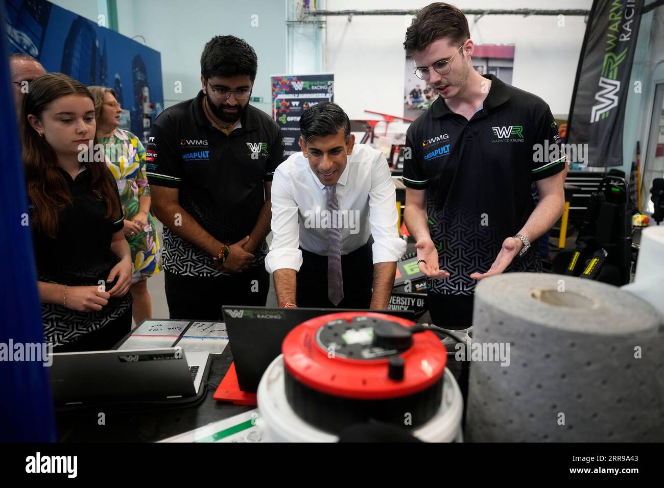Prime Minister Rishi Sunak (second right) views the build of an ...