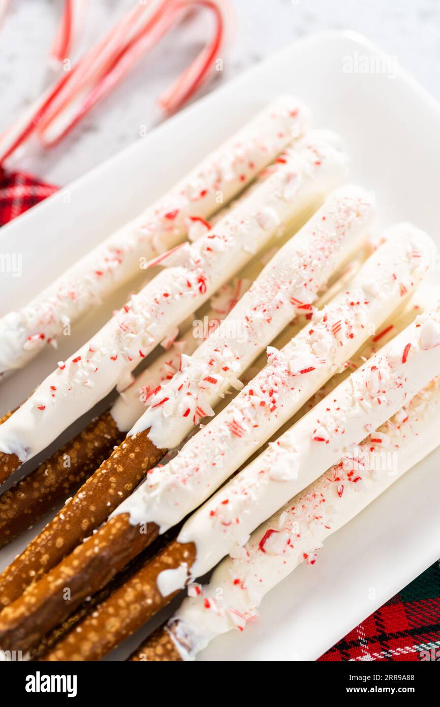 Candy cane chocolate covered pretzel rods Stock Photo - Alamy