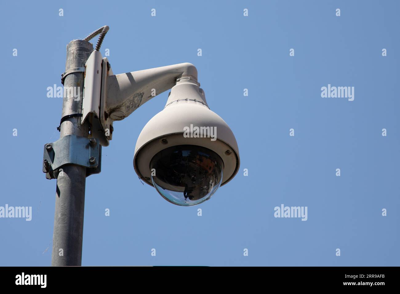 CCTV round mast surveillance camera with 360 degree vision on city ...