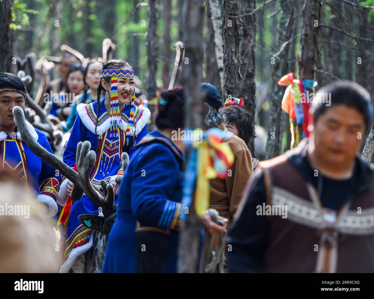 210610 -- GENHE, June 10, 2021 -- The wedding procession walks in the ...