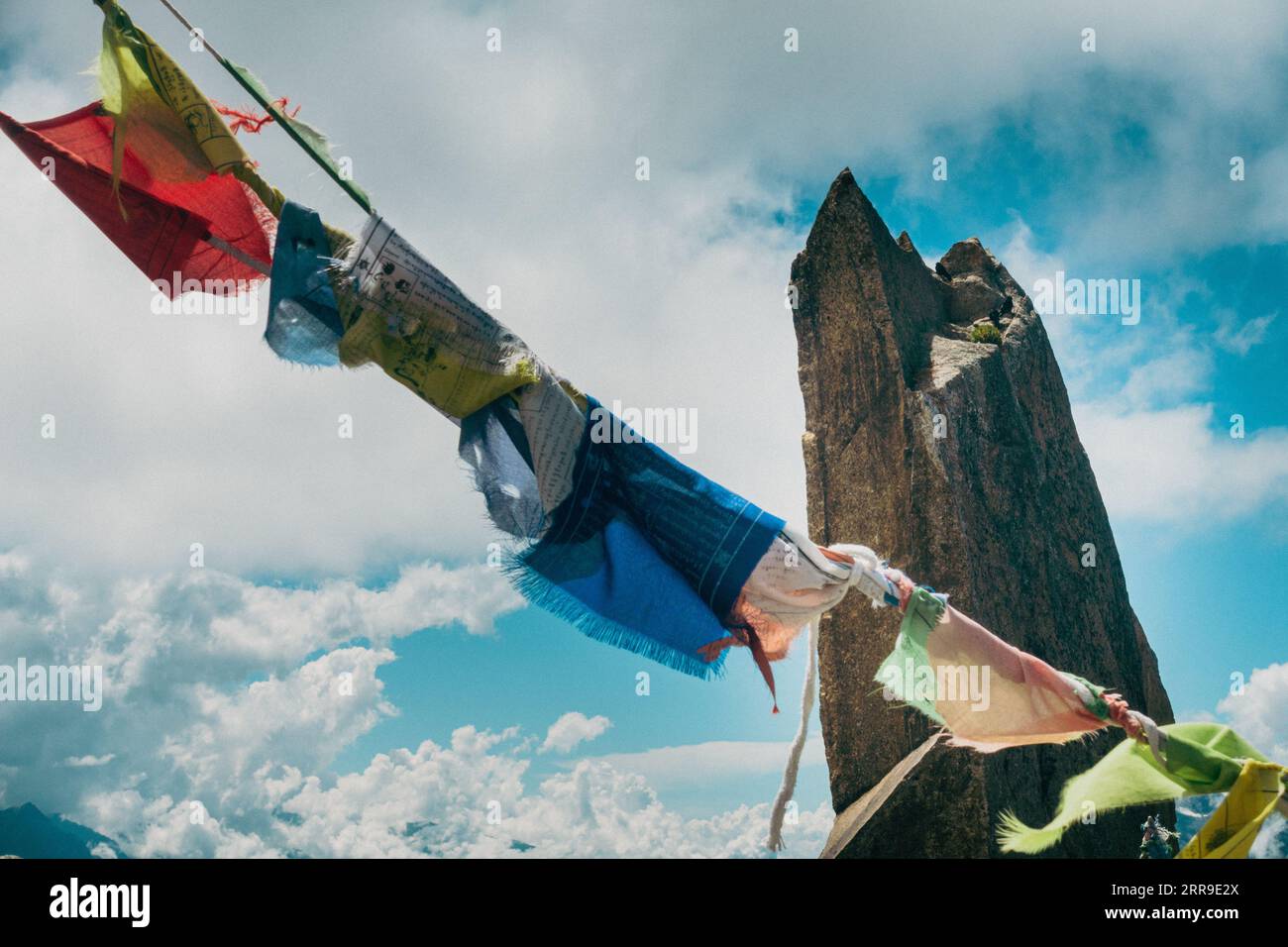 Kinner Kailash Shivling summit with prayer flags in the foreground ...