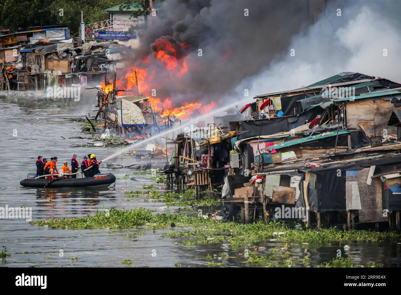 210612 -- MANILA, June 12, 2021 -- Firefighters and members of the ...