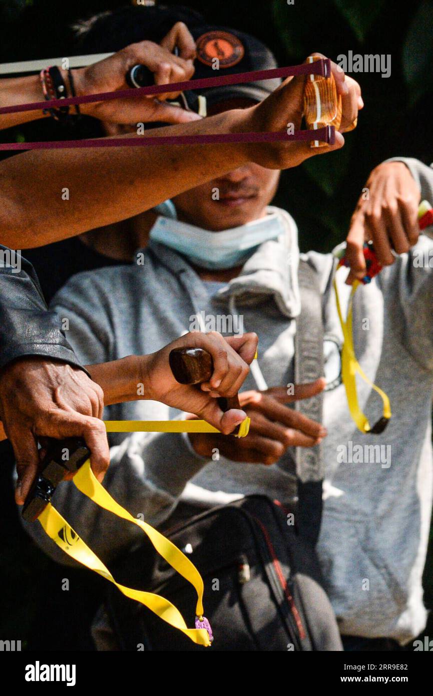 210612 -- JAKARTA, June 12, 2021 -- People participate in a traditional ...