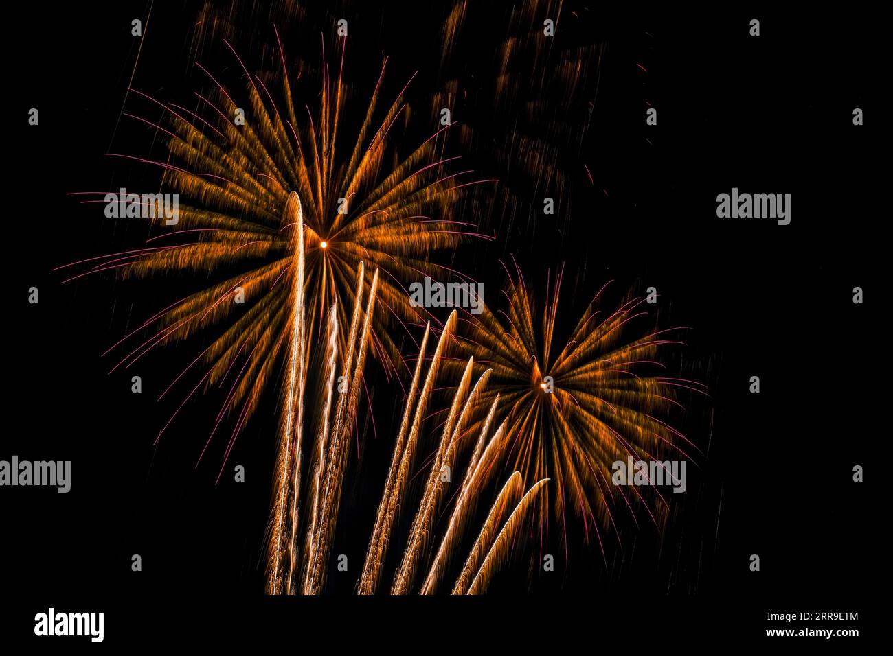 Colorful fireworks exploded in the night sky Stock Photo - Alamy