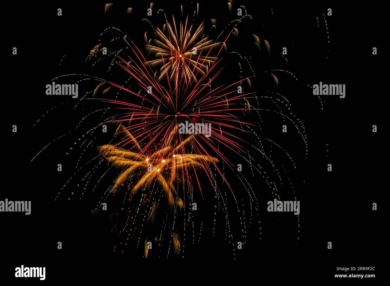 Colorful fireworks exploded in the night sky Stock Photo - Alamy