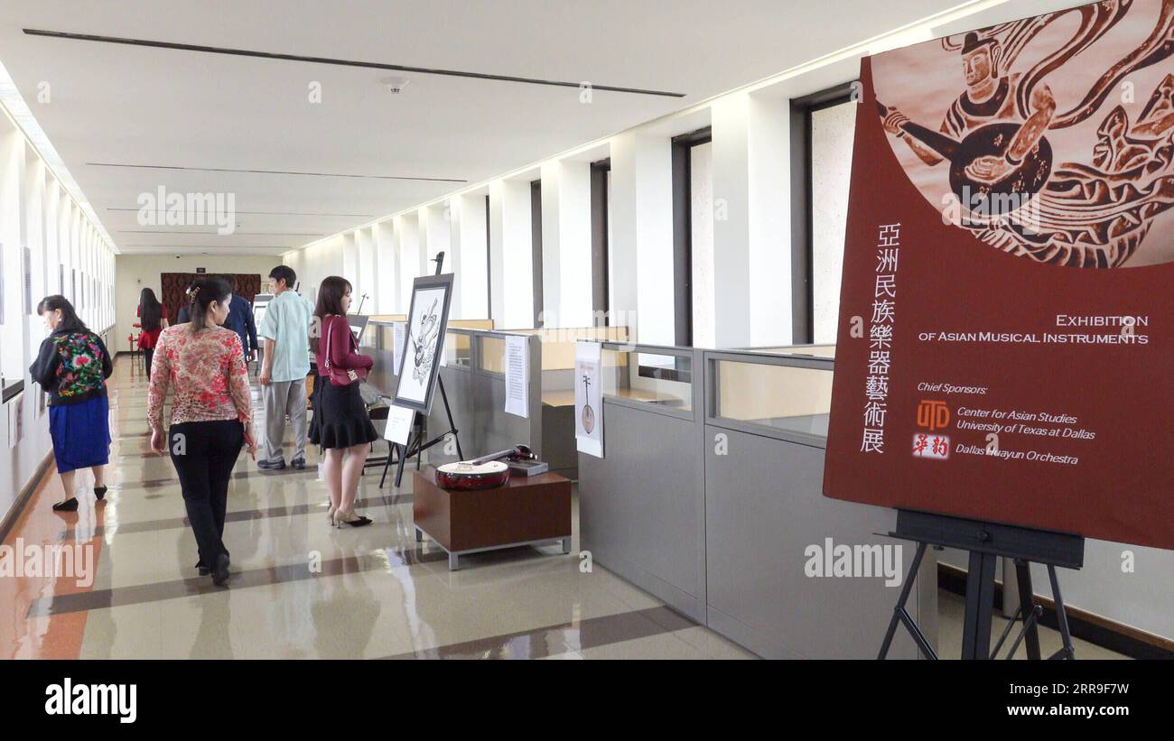 210613 -- DALLAS, June 13, 2021 -- People visit the Exhibition of Asian ...