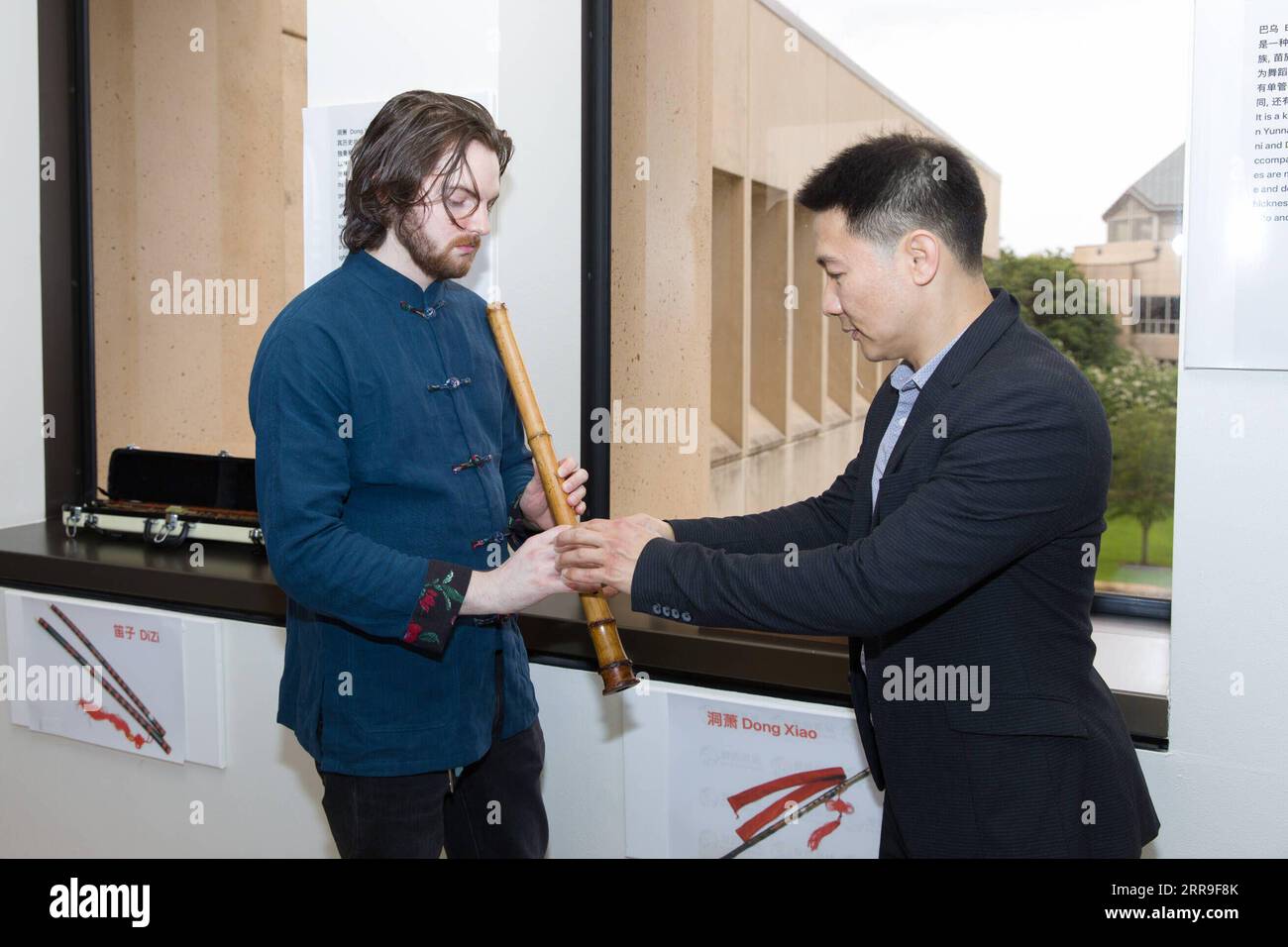 210613 -- DALLAS, June 13, 2021 -- A young man L tries to play Dong ...