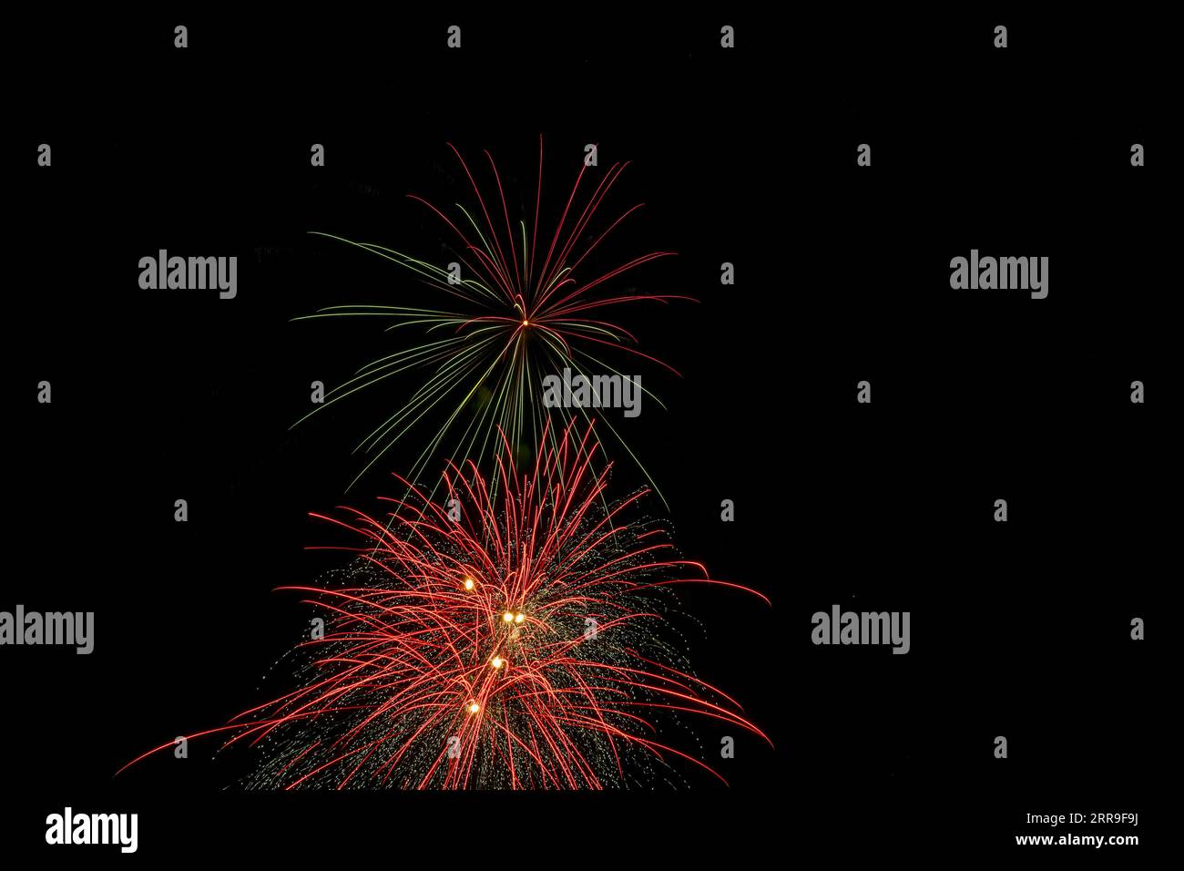 Colorful fireworks exploded in the night sky Stock Photo - Alamy
