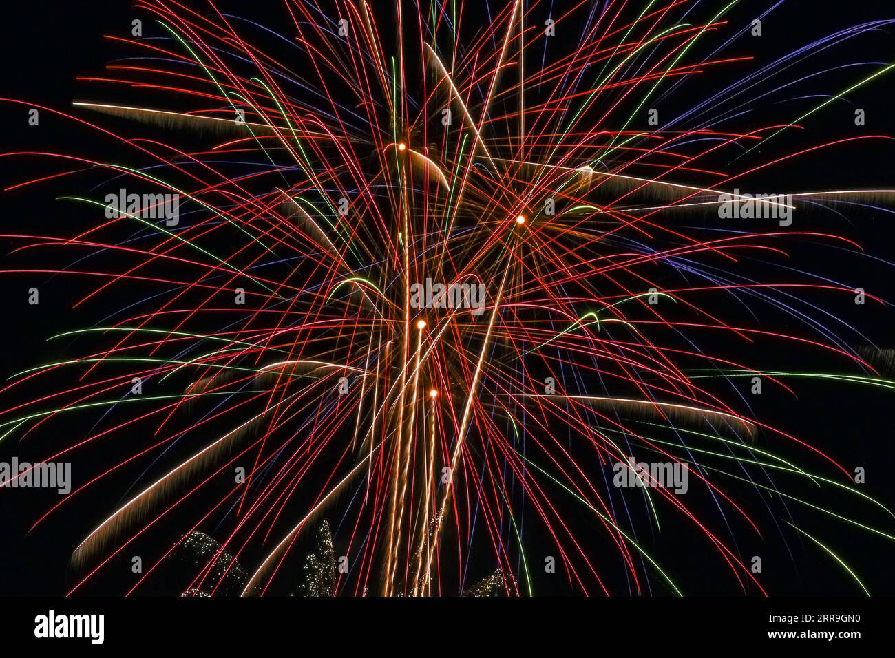 Bright red firework exploded hi-res stock photography and images - Alamy