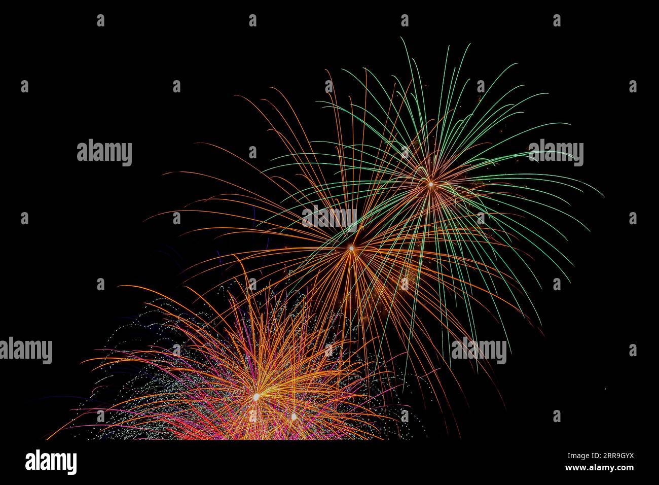 Colorful fireworks exploded in the night sky Stock Photo - Alamy