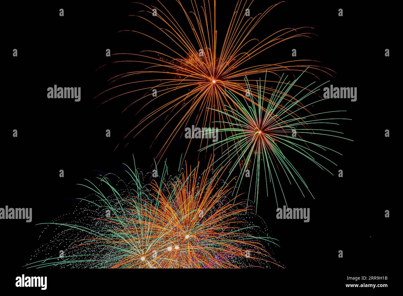 Colorful fireworks exploded in the night sky Stock Photo - Alamy