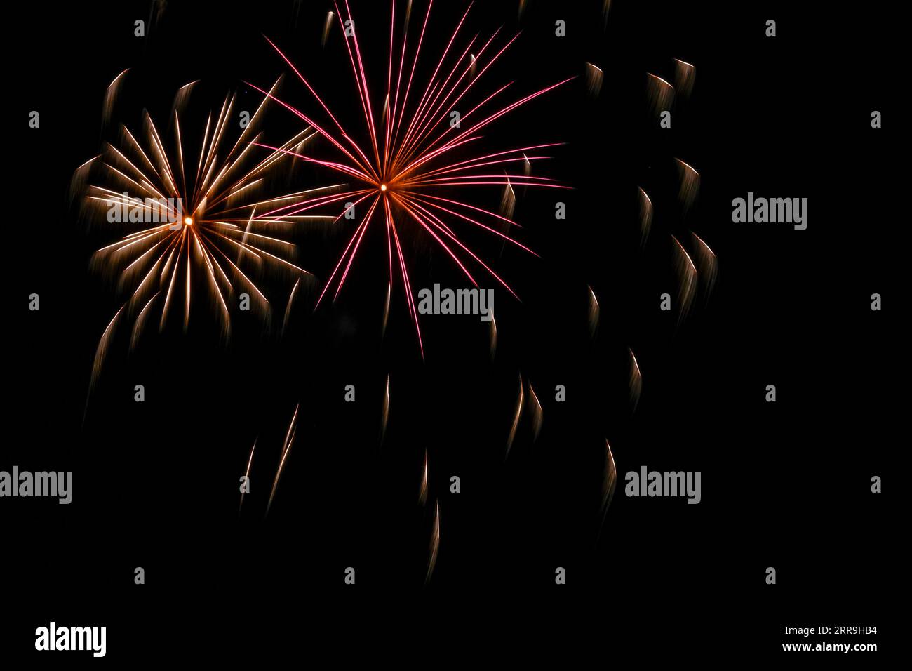 Colorful fireworks exploded in the night sky Stock Photo - Alamy