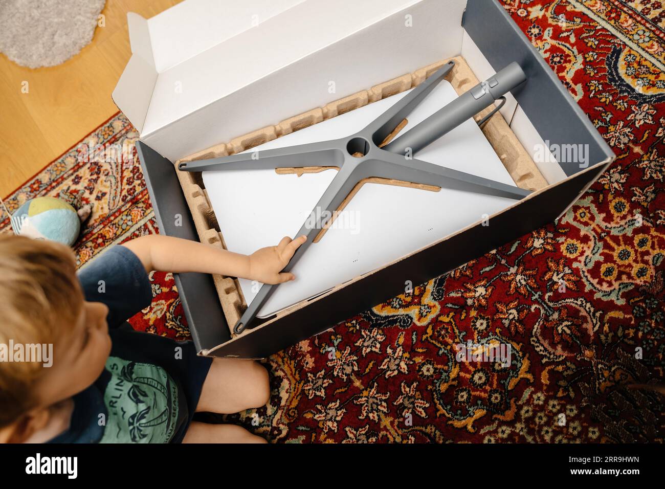 Bremen, Germany - Aug 14, 2023: A boy reveals the antenna of a SpaceX ...