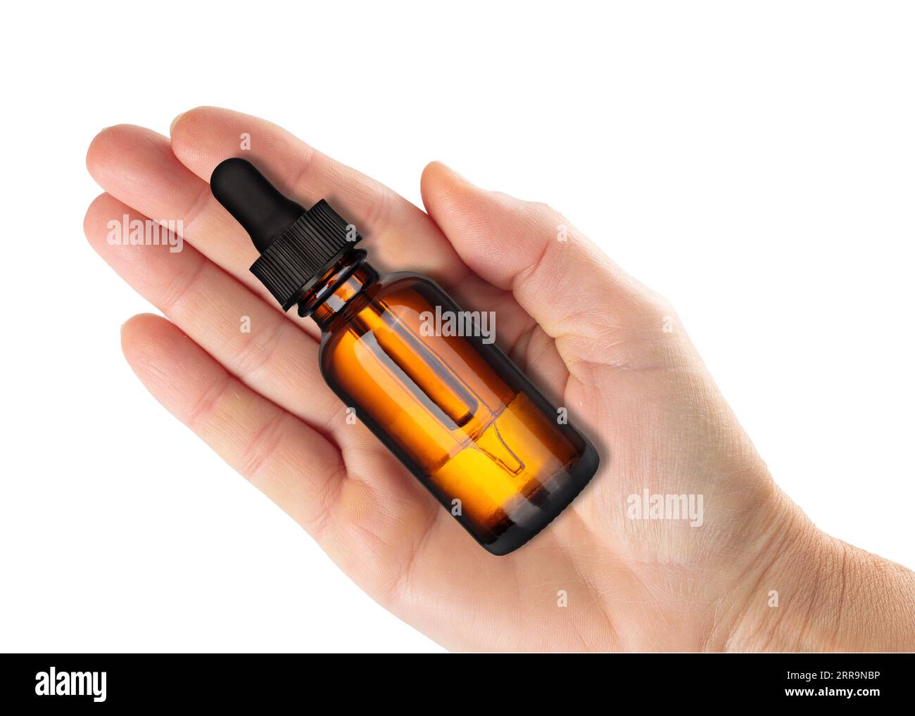 Top View Presentation of Classic Dropper Bottle in Hand Stock Photo - Alamy