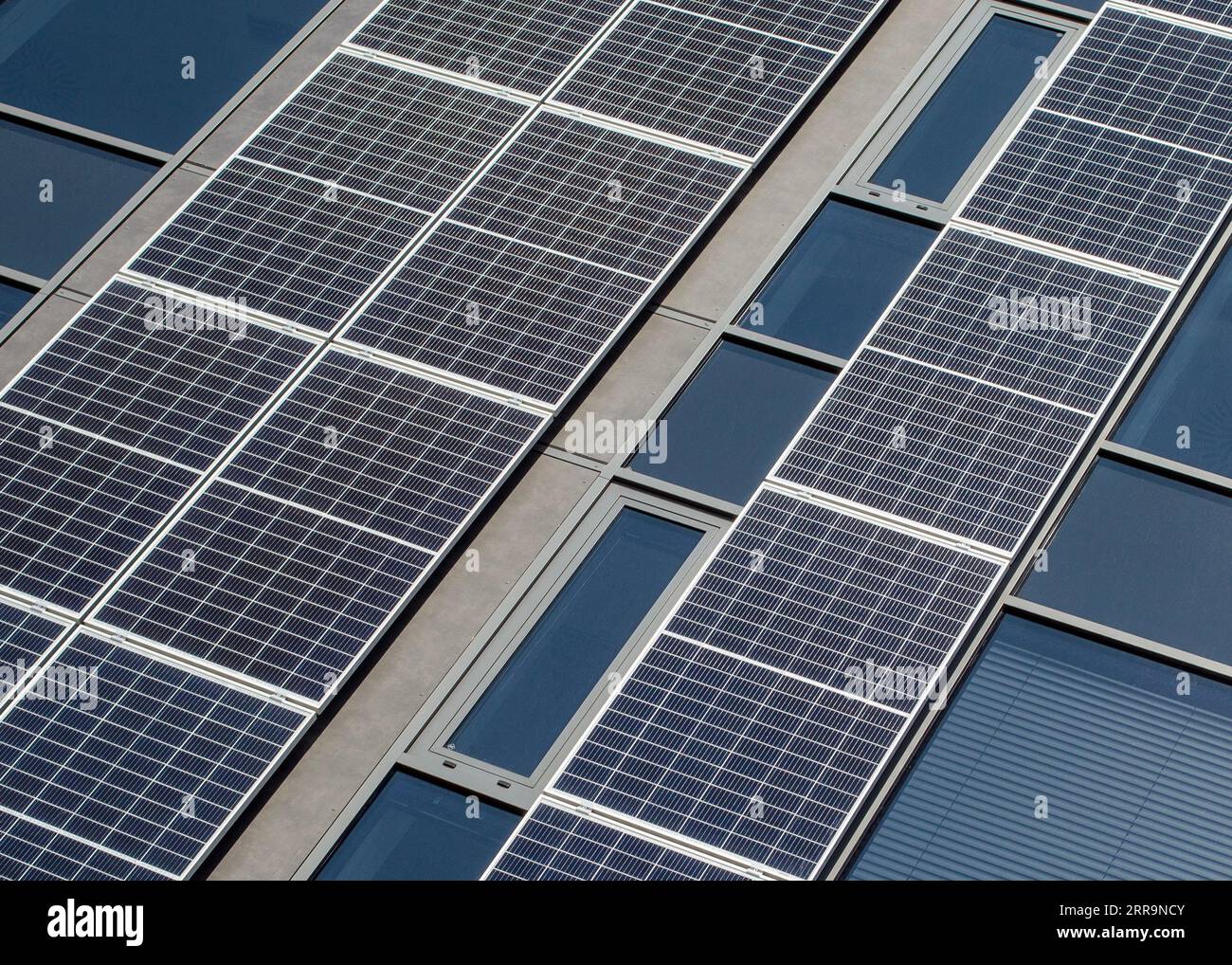 Solar Power Modules Adorning Building Facade Stock Photo - Alamy