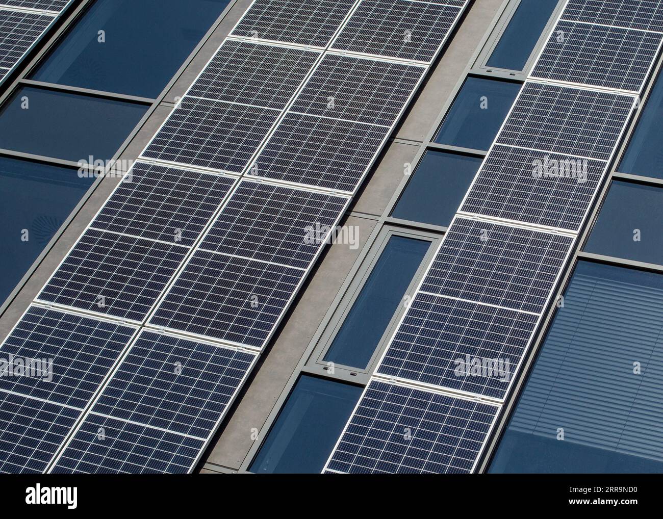 Solar Panel-Integrated Modern Building Facade Stock Photo - Alamy