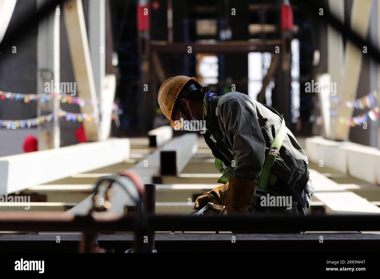 210702 -- CAIRO, July 2, 2021 -- A worker installs a steel skyway ...