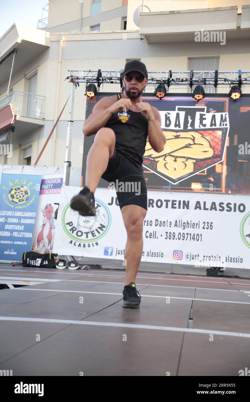 The images depict an animated children's kickboxing class in Italy at a ...