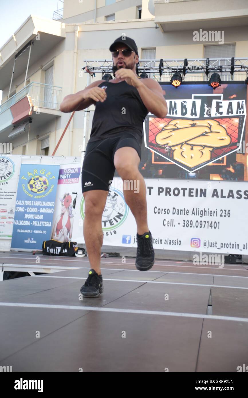The images depict an animated children's kickboxing class in Italy at a ...