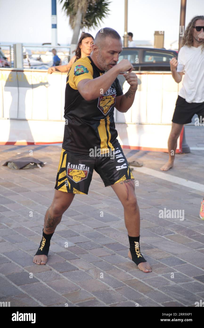 The images depict an animated children's kickboxing class in Italy at a ...