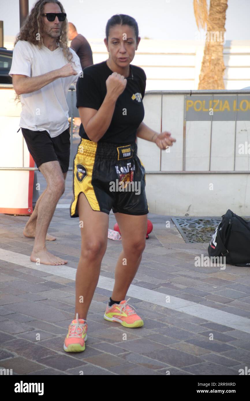The images depict an animated children's kickboxing class in Italy at a ...