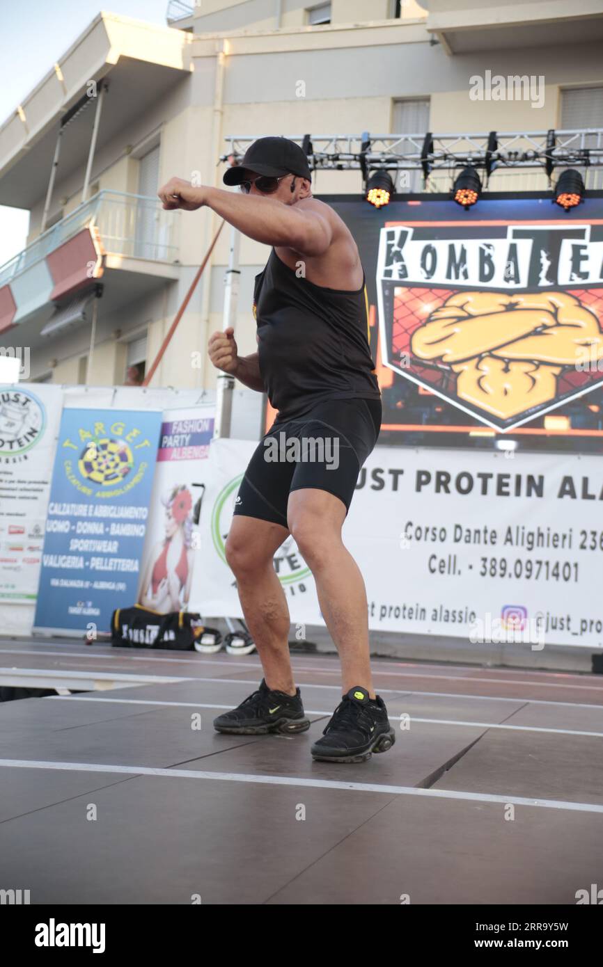 The images depict an animated children's kickboxing class in Italy at a ...
