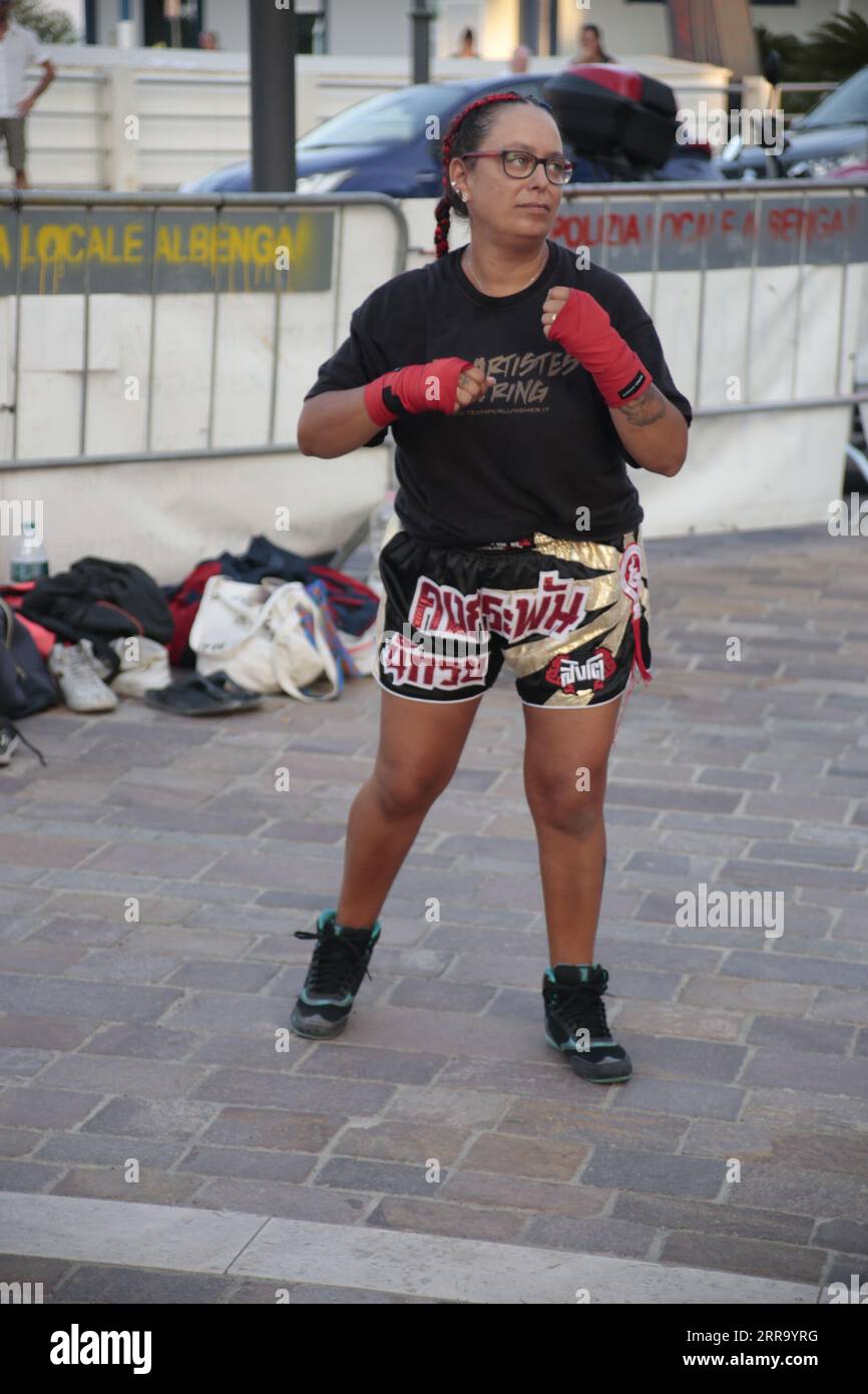 The images depict an animated children's kickboxing class in Italy at a ...