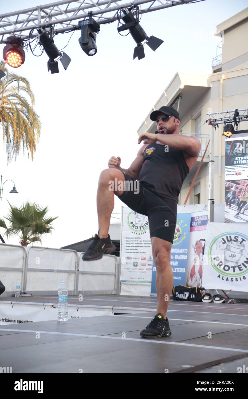 The images depict an animated children's kickboxing class in Italy at a ...