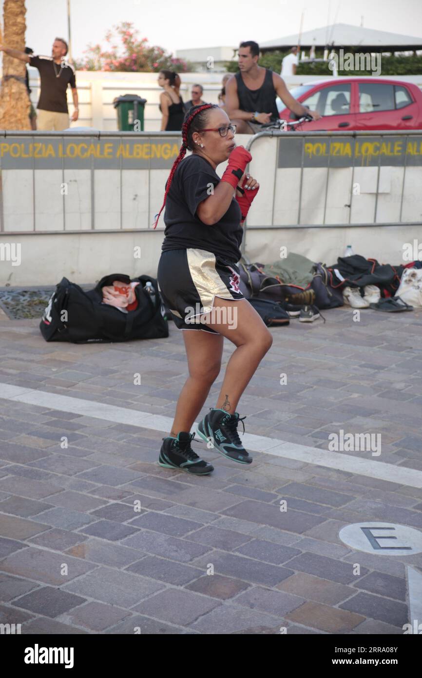 The images depict an animated children's kickboxing class in Italy at a ...