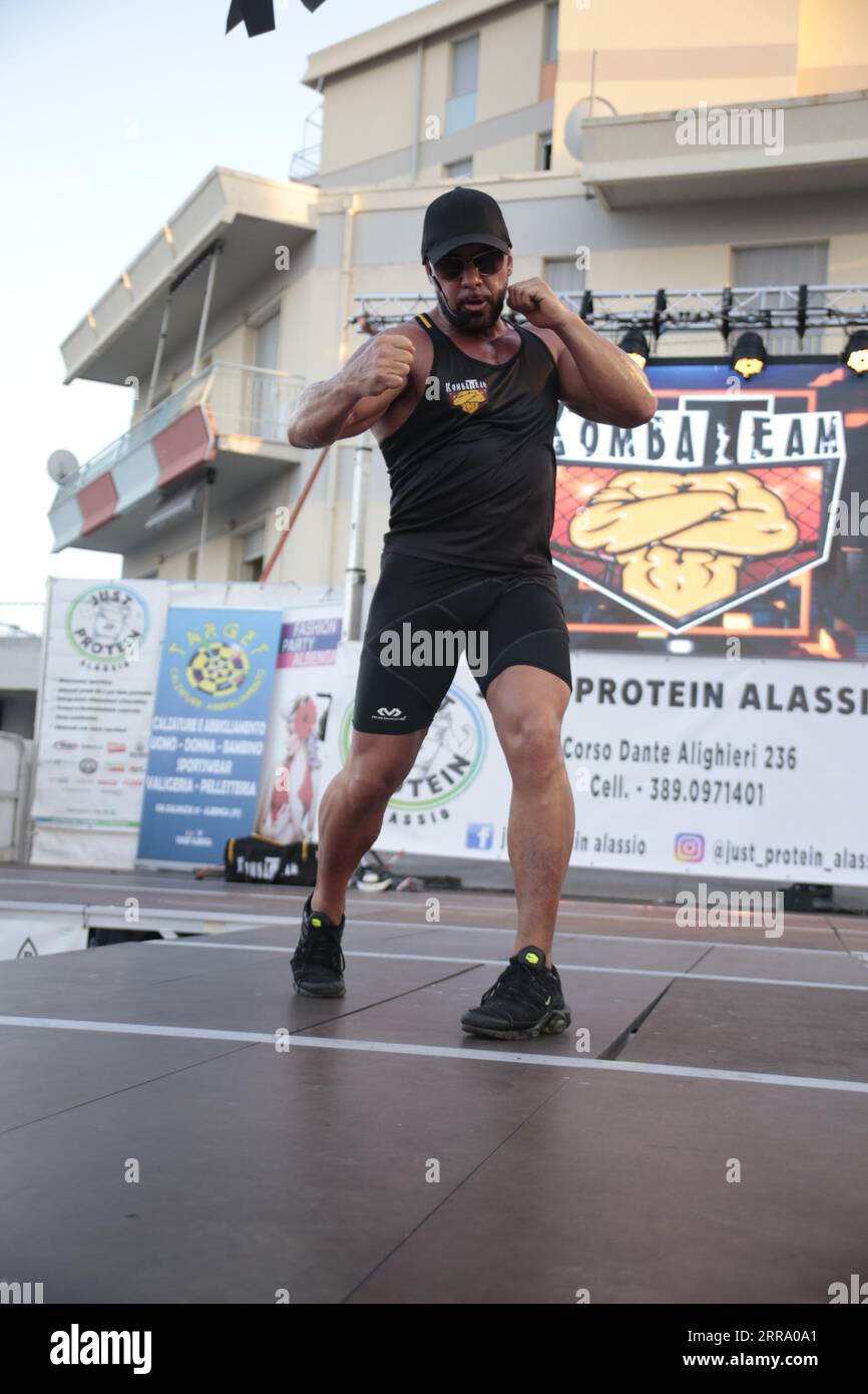The images depict an animated children's kickboxing class in Italy at a ...