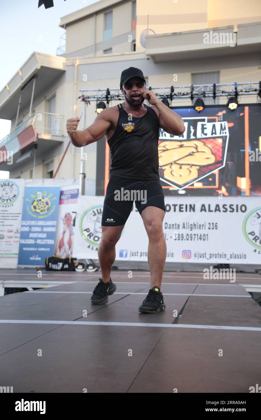 The images depict an animated children's kickboxing class in Italy at a ...