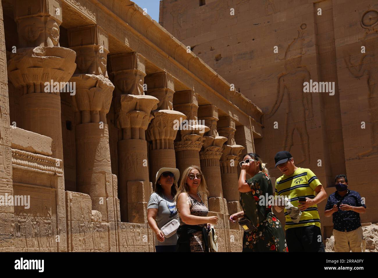 210708 -- ASWAN EGYPT, July 8, 2021 -- Tourists visit the Philae ...