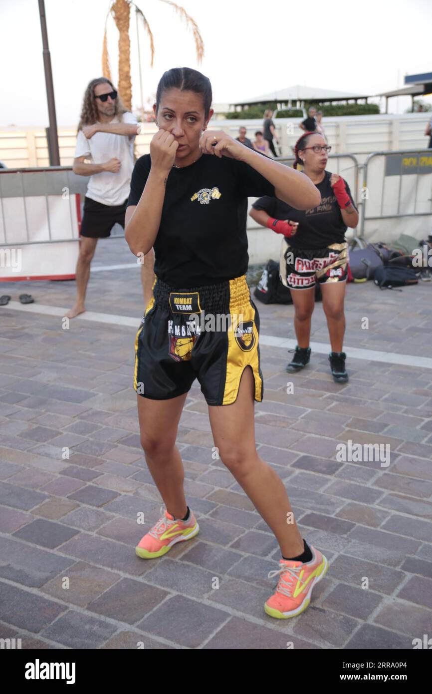 The images depict an animated children's kickboxing class in Italy at a ...