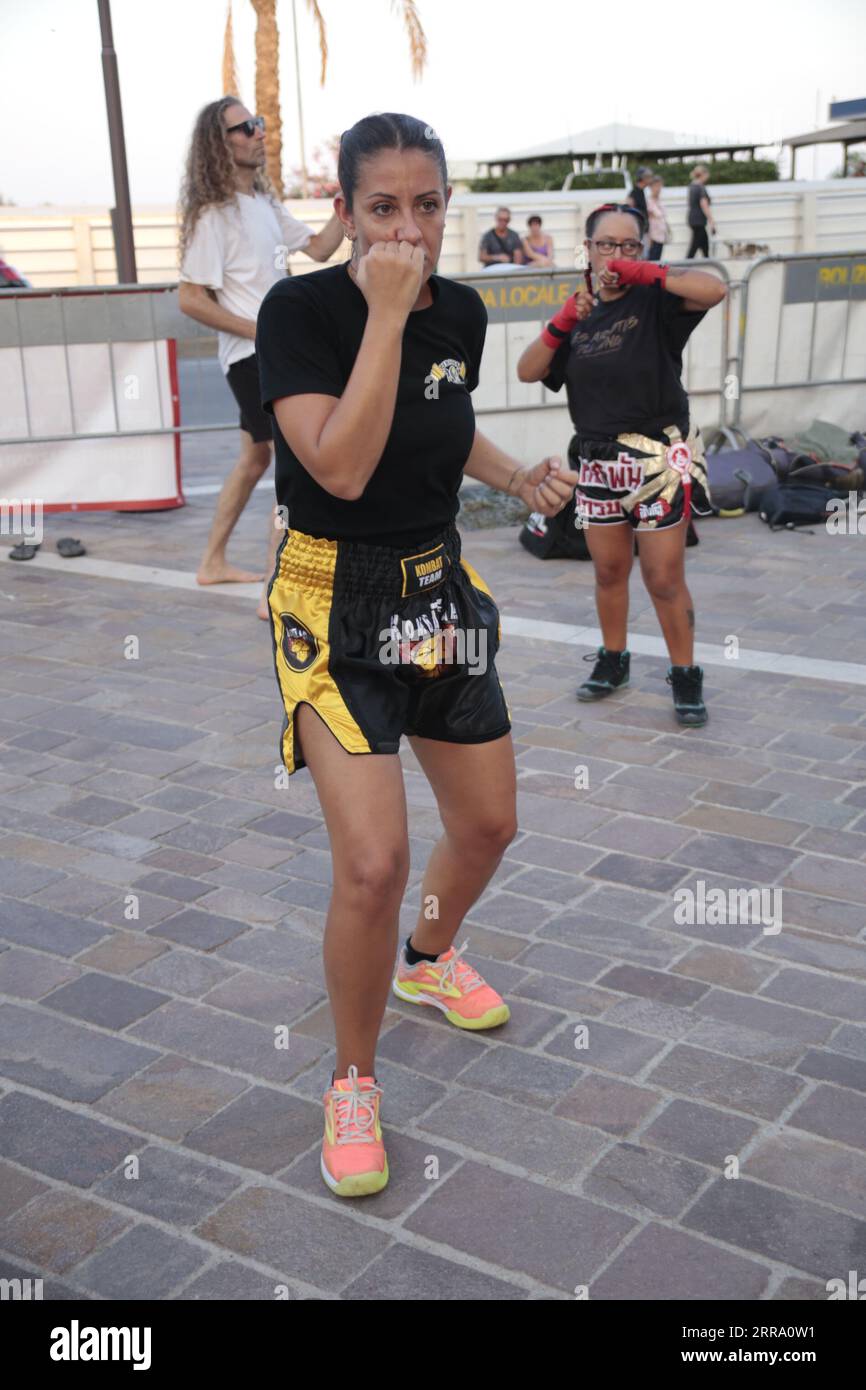 The images depict an animated children's kickboxing class in Italy at a ...