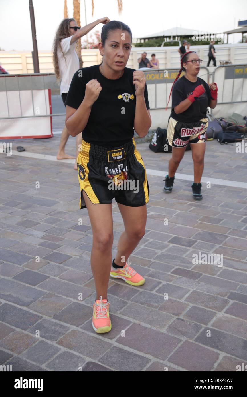 The images depict an animated children's kickboxing class in Italy at a ...