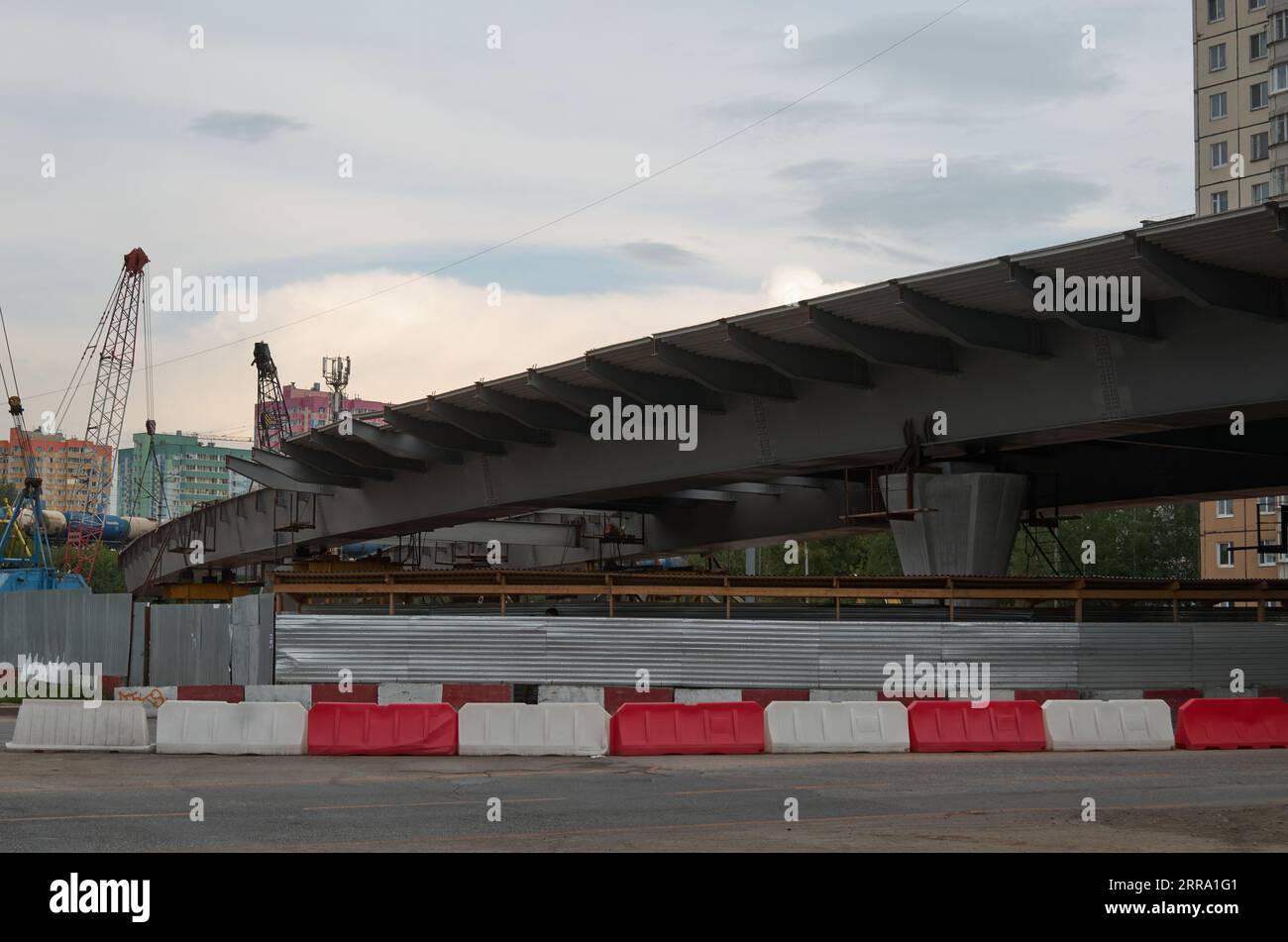 Construction of a road bridge over an existing highway in the city ...